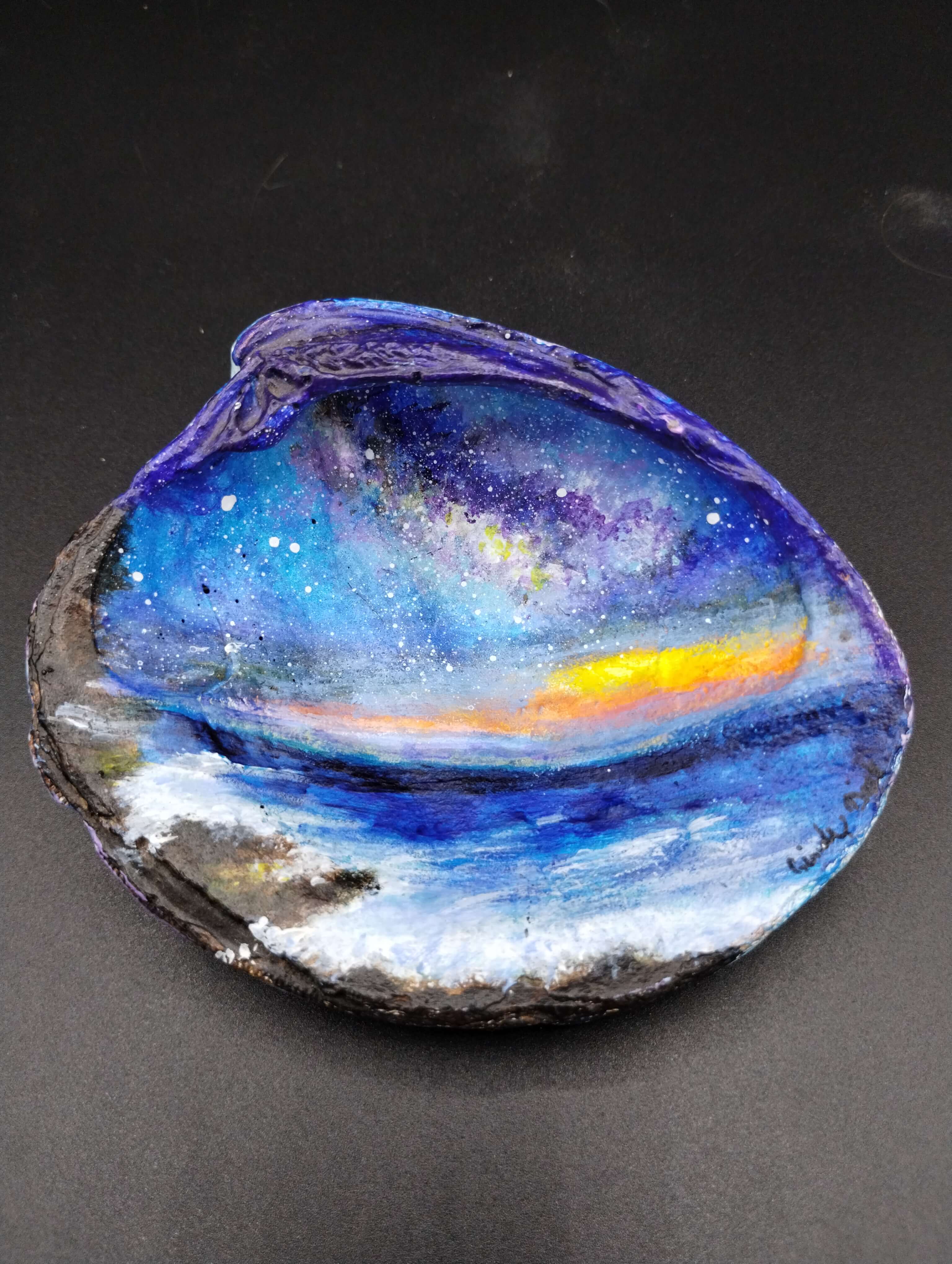 Hand painted clam shell.