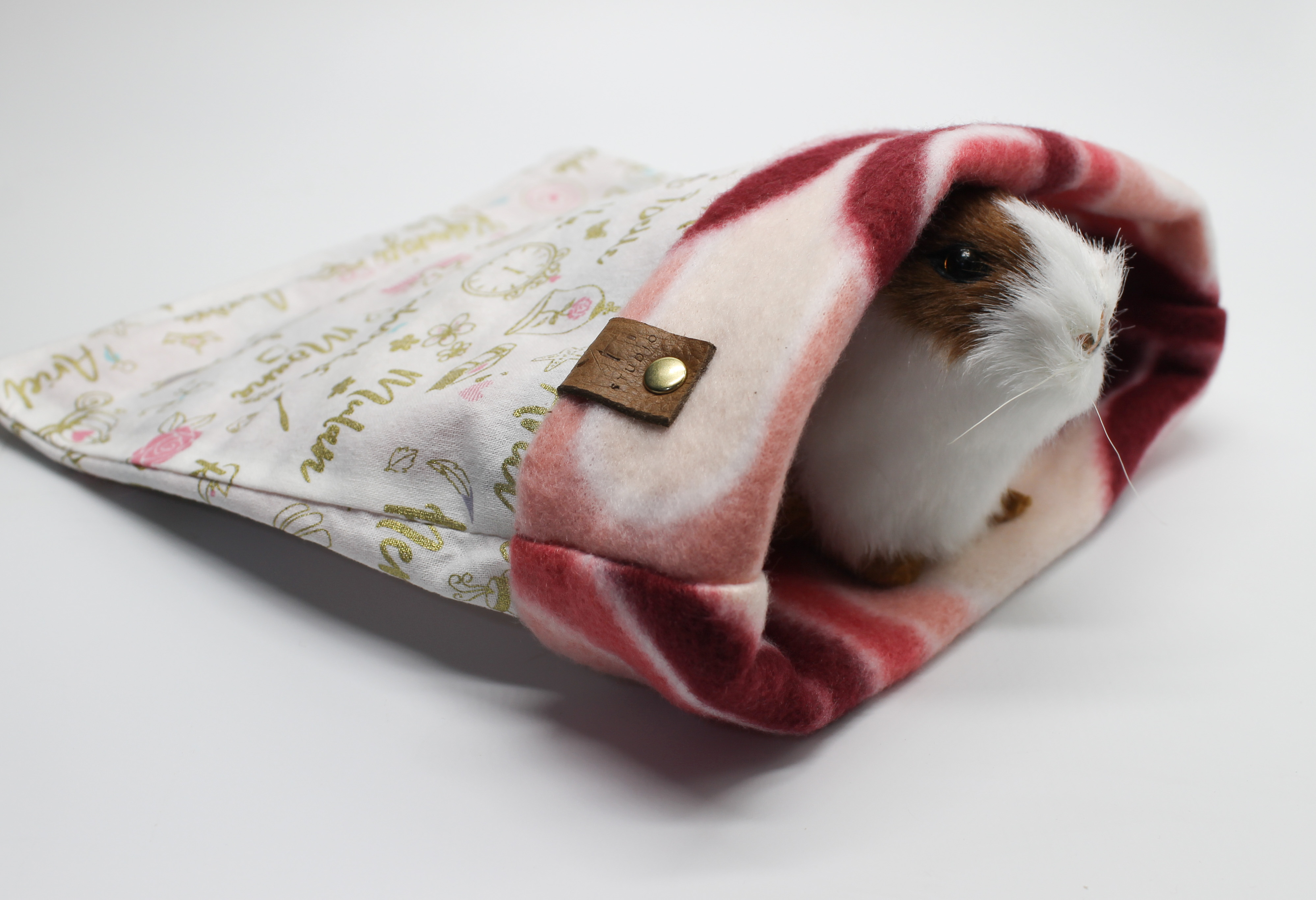 Small animal pet snuggle bag featuring princess themed fabric