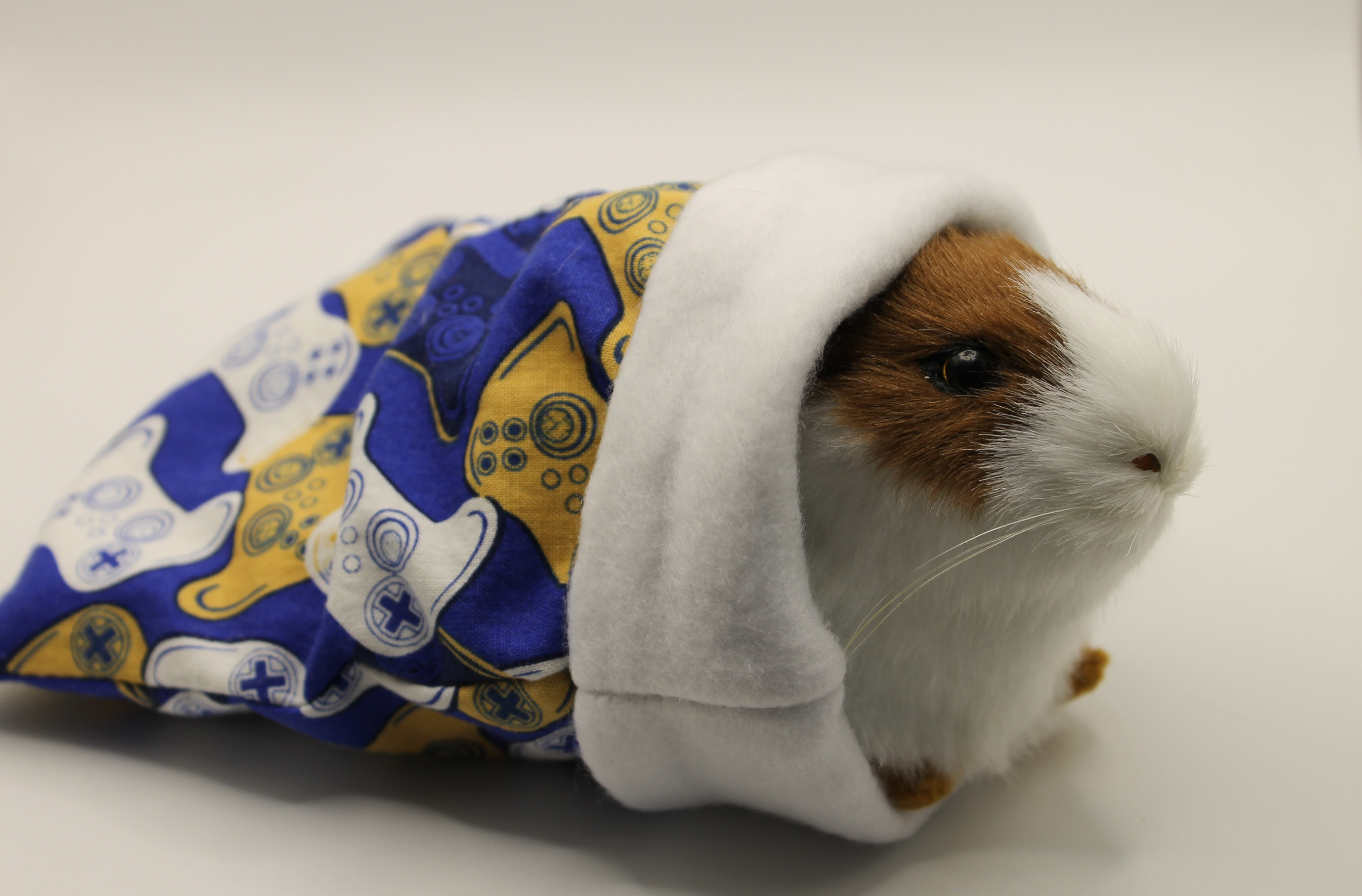 Extra small animal snuggle bag, featuring gamer theme fabric